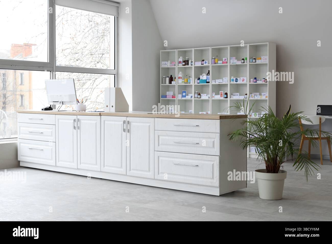 Interior of pharmacy with counter, shelf unit and medications Stock ...