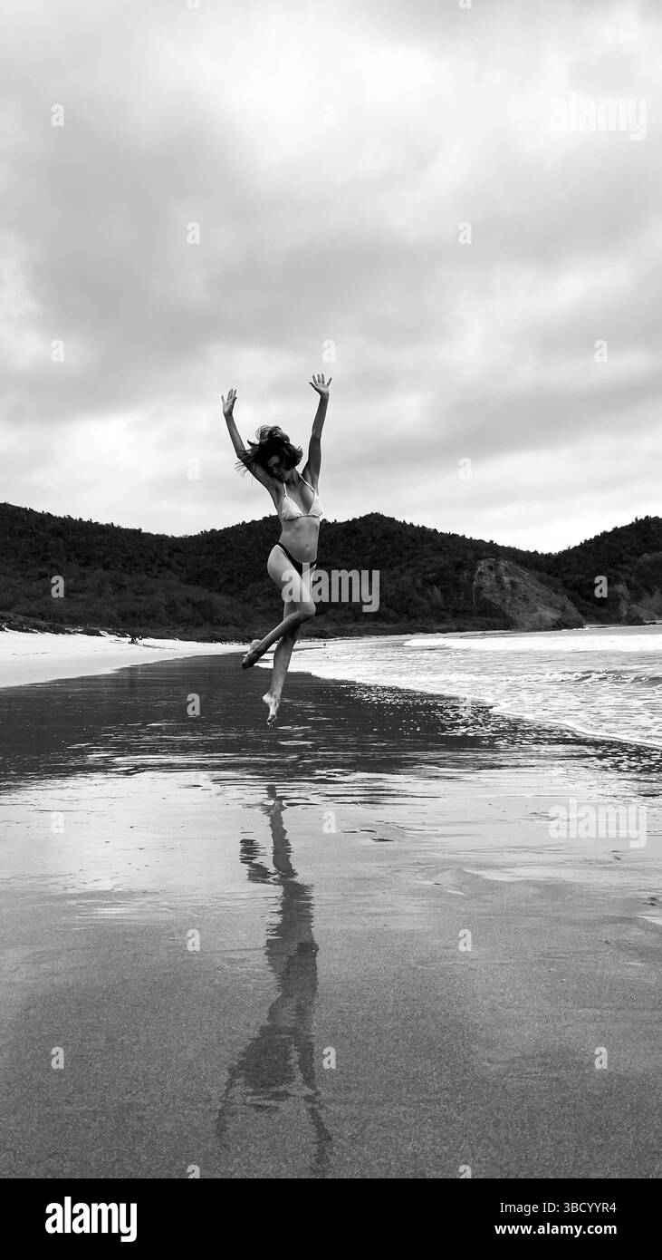 Jumping raised Black and White Stock Photos & Images - Alamy