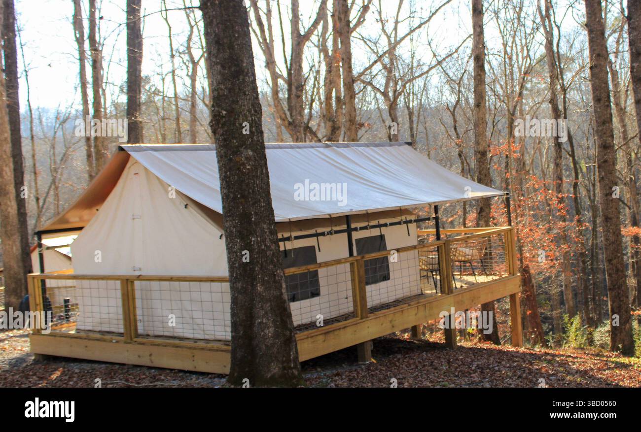 A luxurious canvas tent offers a cozy, secluded escape in the wilds ...