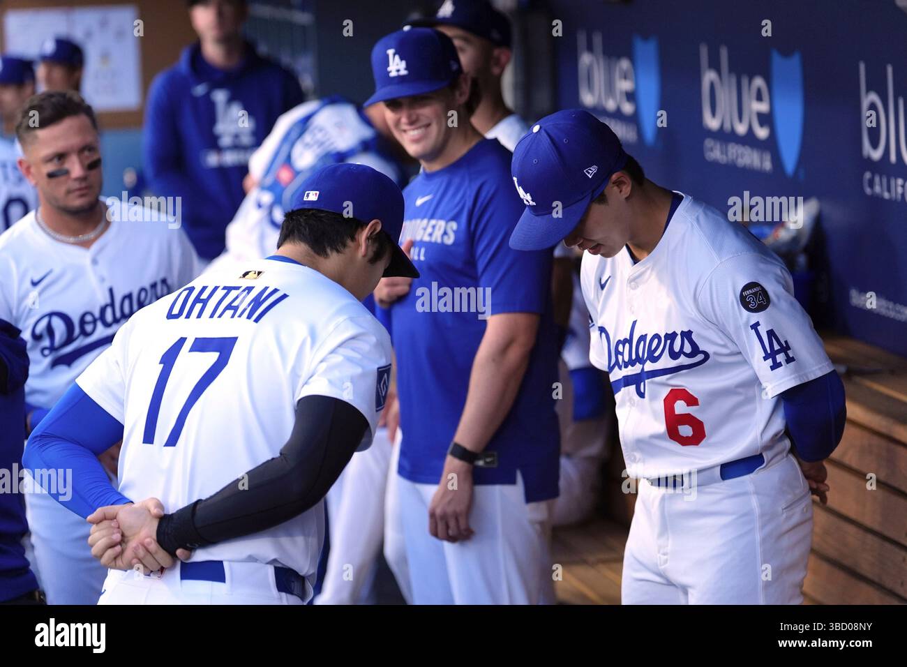 Los Angeles Dodgers' Shohei Ohtani, left, and Hyeseong Kim bow to each ...