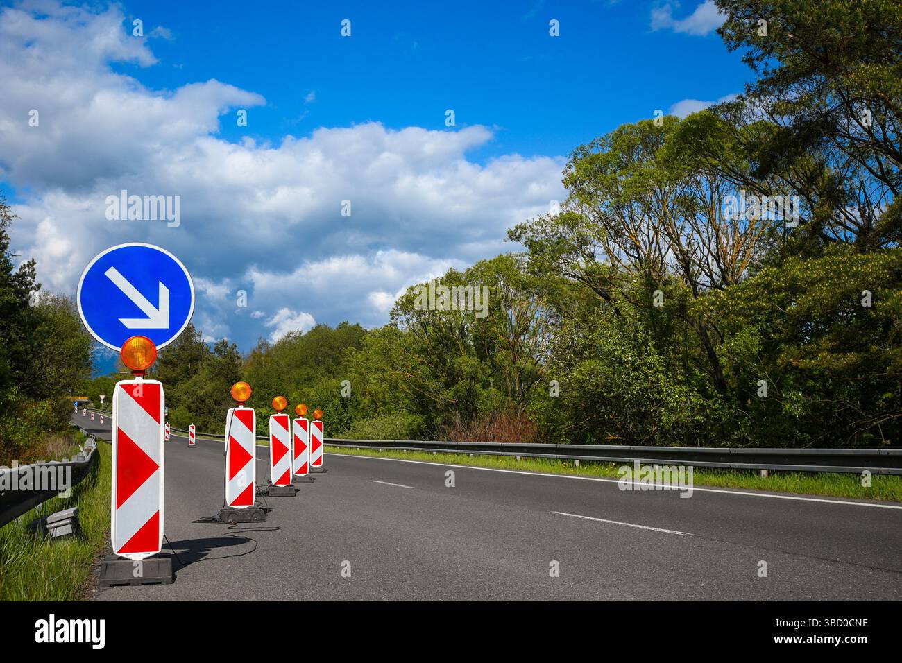 Deviation arrow traffic cones hi-res stock photography and images - Alamy