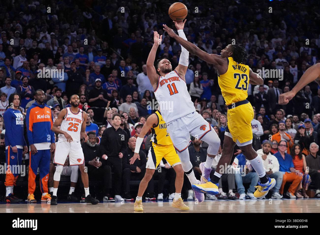 New York Knicks guard Jalen Brunson (11) puts up a shot against Indiana ...