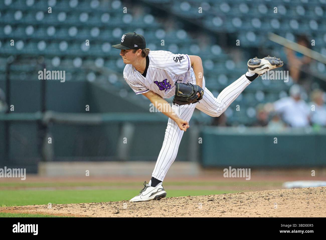 Winston-Salem, NC: Winston-Salem Dash pitcher Clete Hartzog (16) warms ...