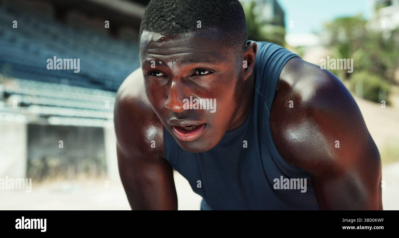 Fitness, black man and tired with breathing at stadium for race ...