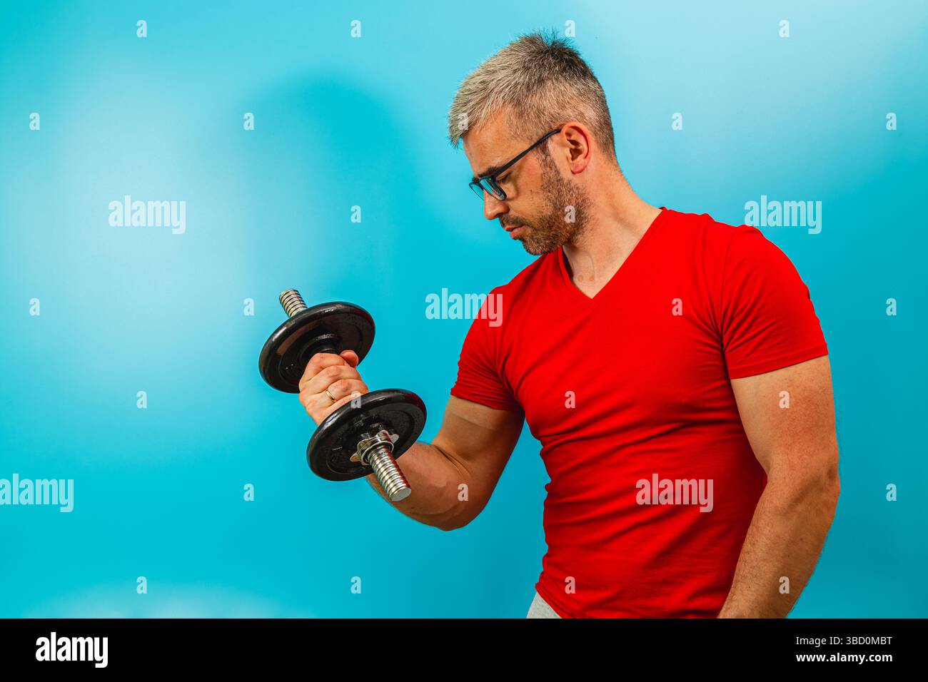 Athlete in red workout attire hi-res stock photography and images - Alamy