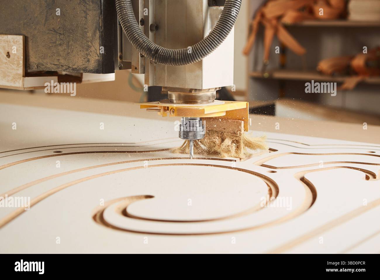 Numerically controlled woodworking machine cuts rounded complex lines ...
