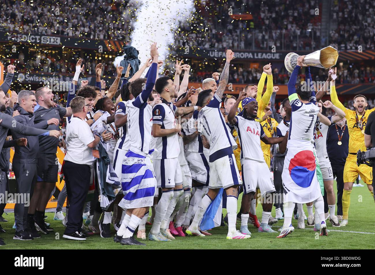 Players of Tottenham celebrate with the trophy after winning the UEFA ...