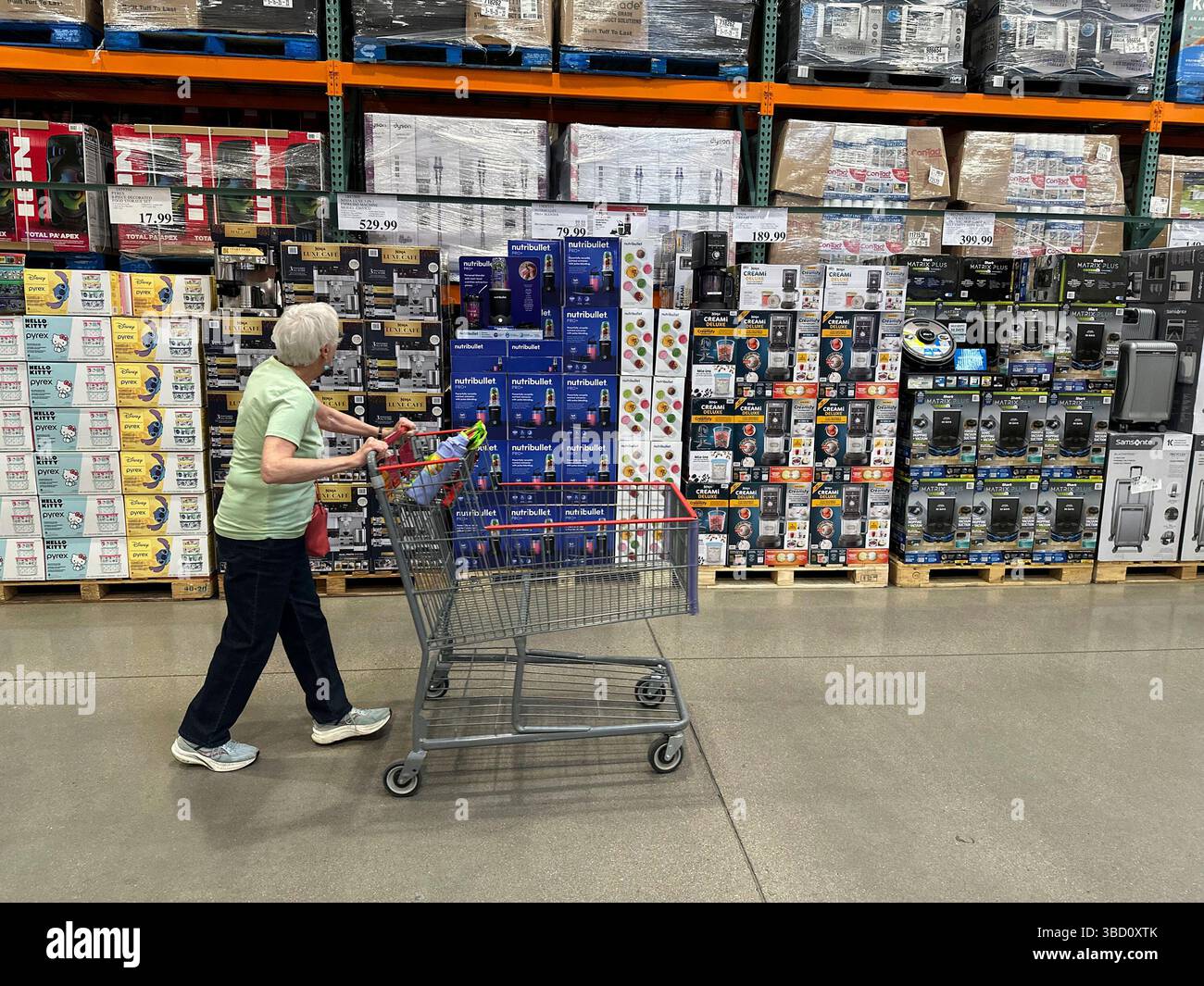 A shopper surveys goods on display in a Costco warehouse Wednesday, May ...