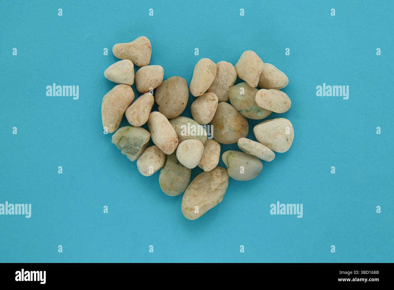 Heart-shaped design made from stones, a visual representation of love ...