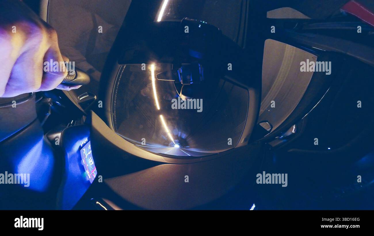 Driving a car in a highway with wide windshield and wide angle view ...