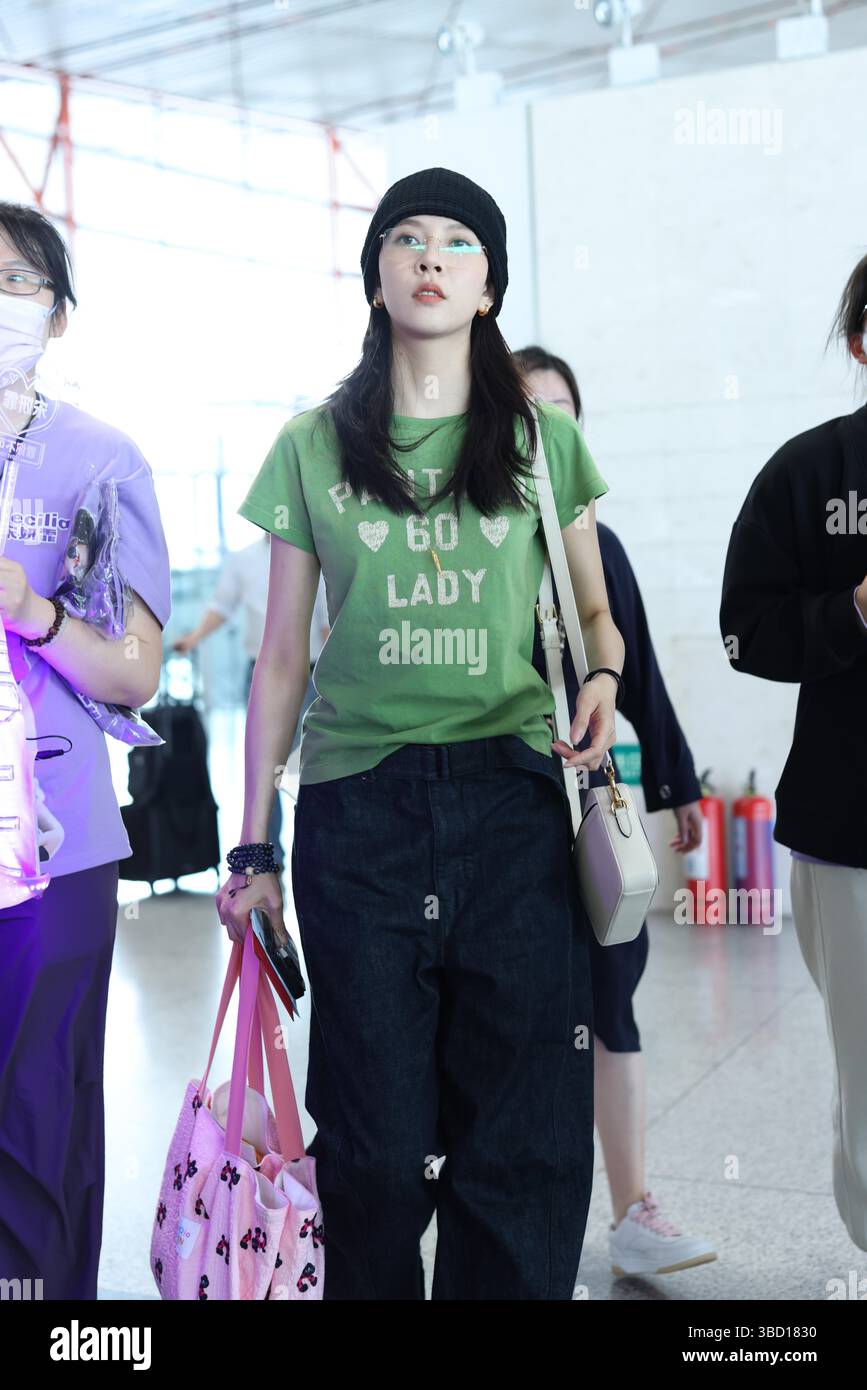 Chinese actress, singer and dancer Song Yanfei appears at the airport ...