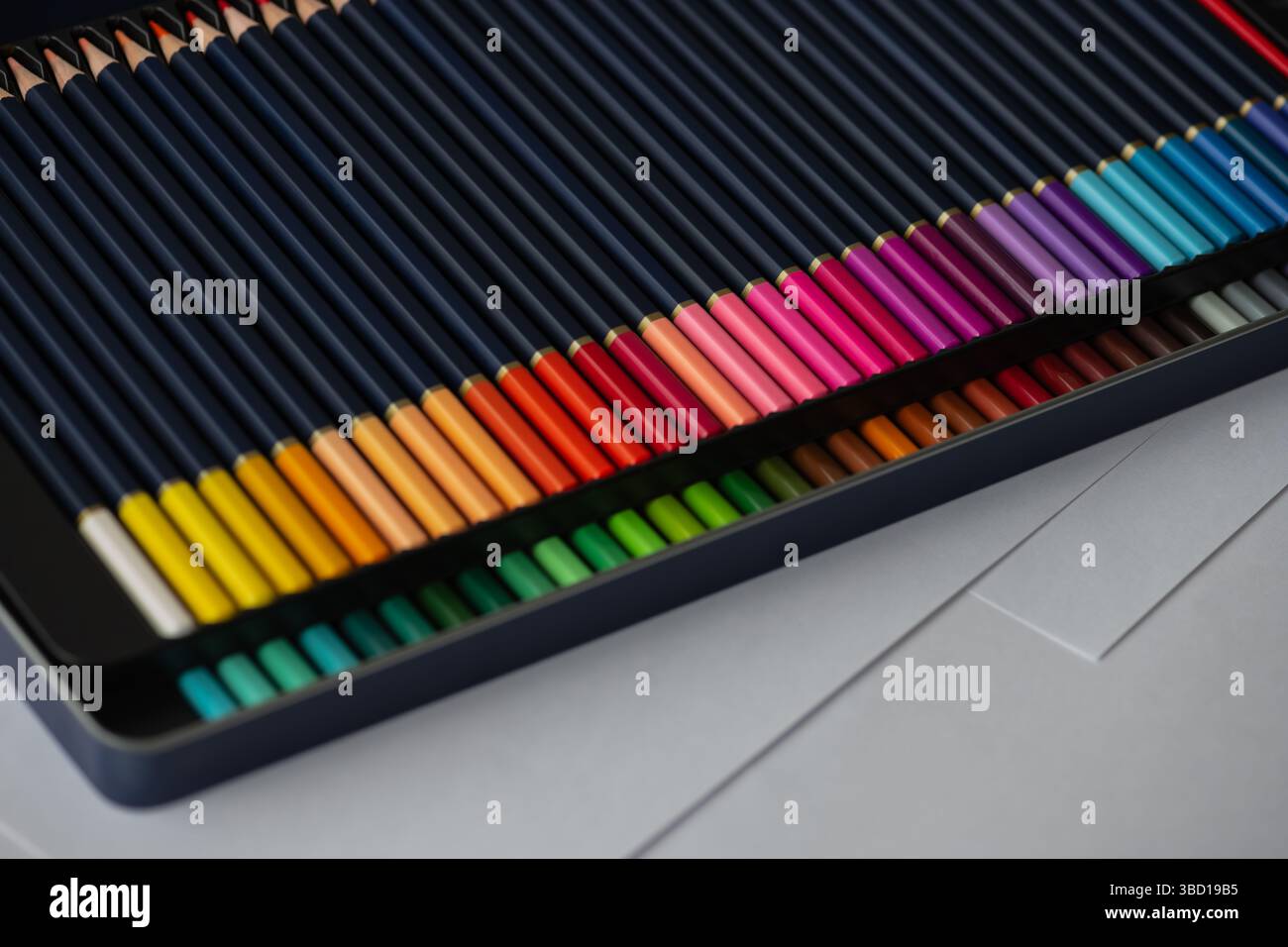 Set of two rows of colored pencils in a pencil case. Big beautiful ...