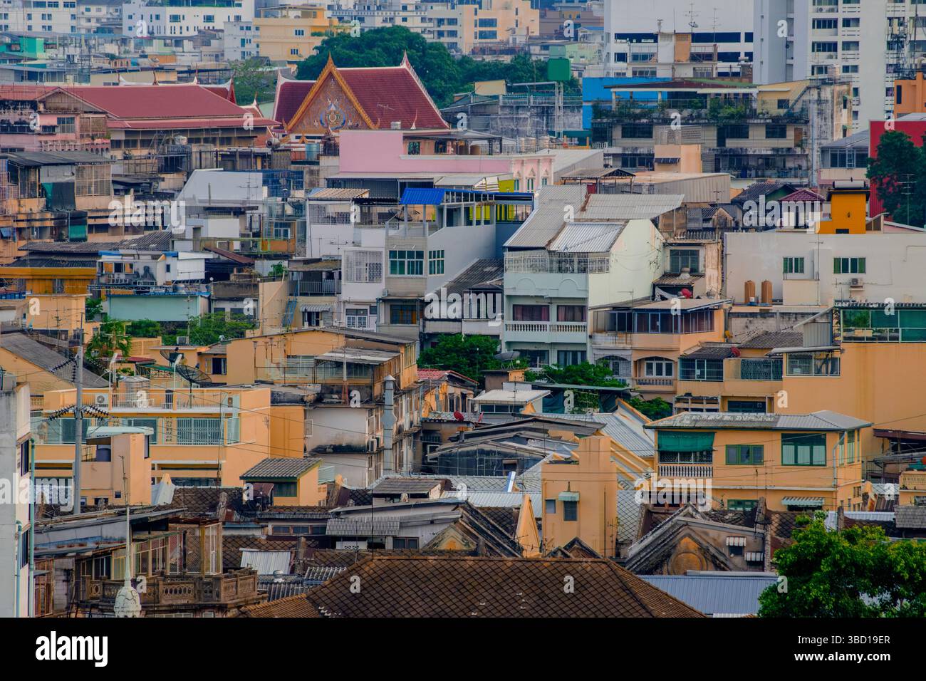 View of a densely packed neighborhood in Bangkok, Thailand. Traditional ...