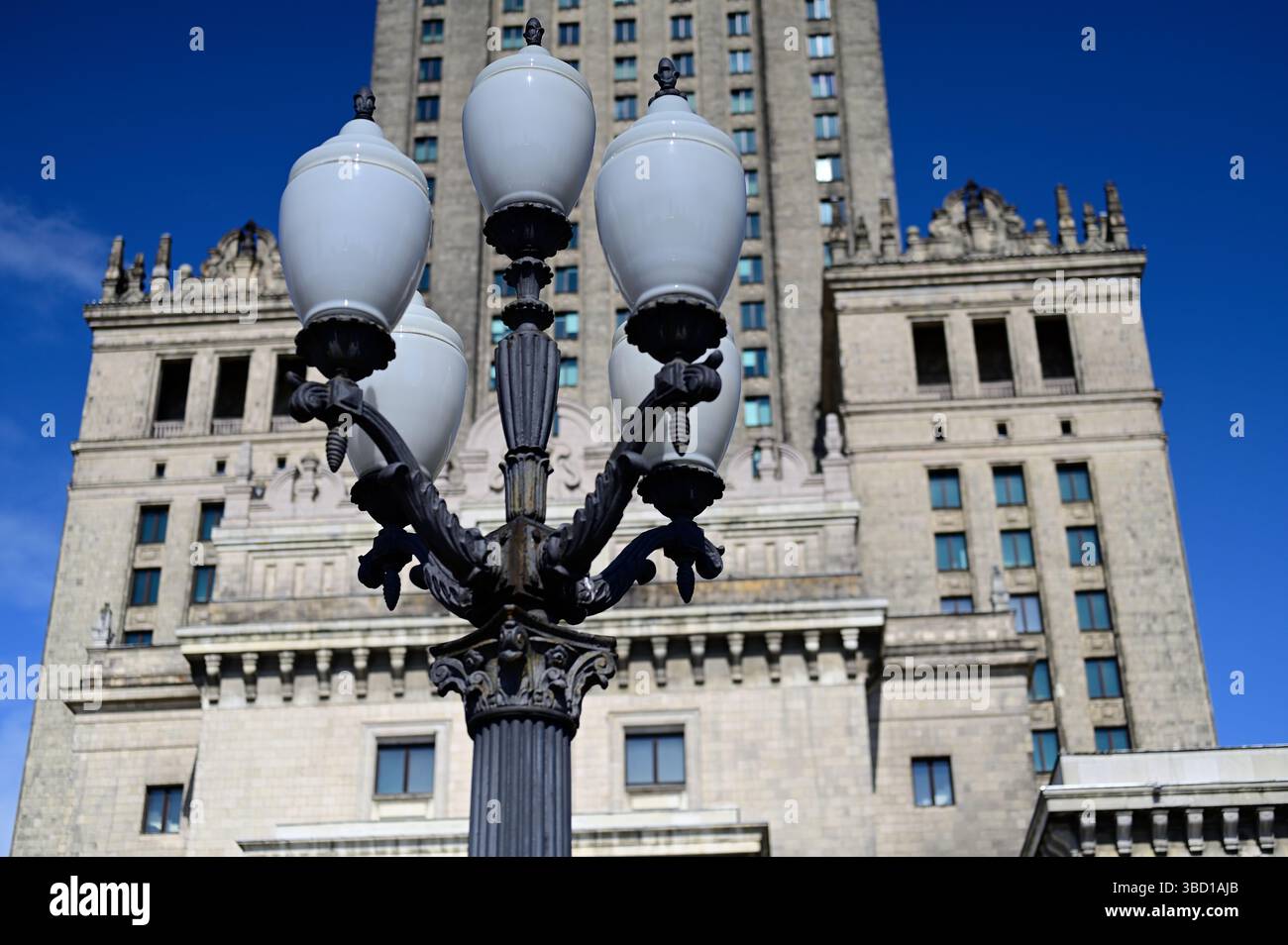 Five lamps in a street lamp and a building Stock Photo - Alamy