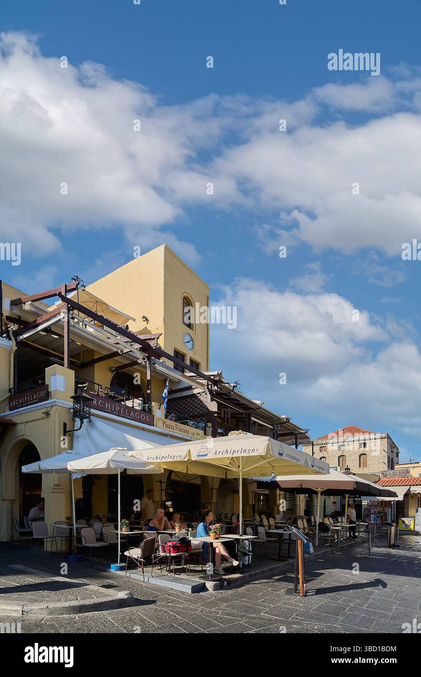 Rodas.Greece - may 22, 2025: A welcoming outdoor restaurant terrace in ...