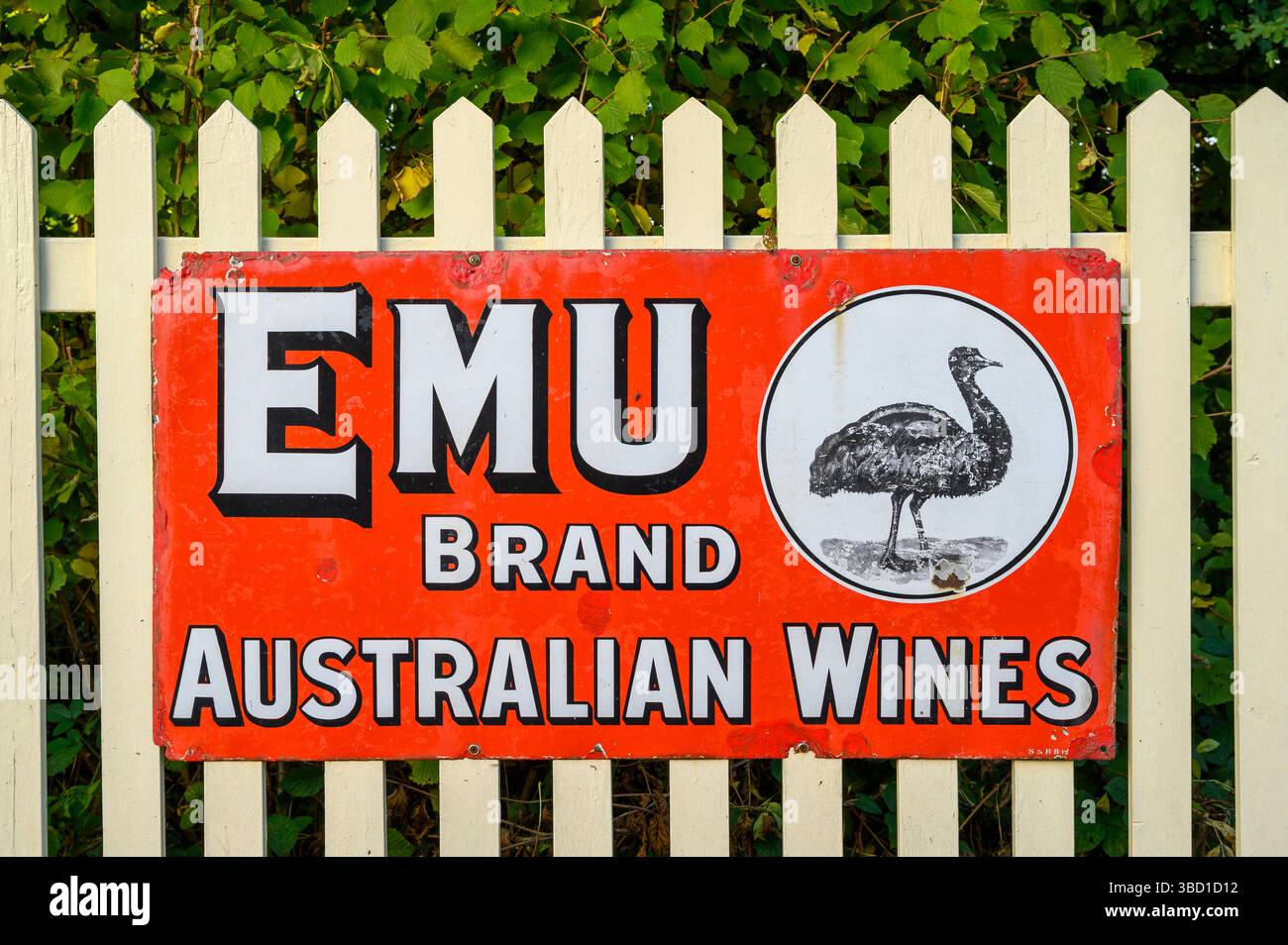 Vintage enamel advertising sign Emu Wines on a picket fence outside ...
