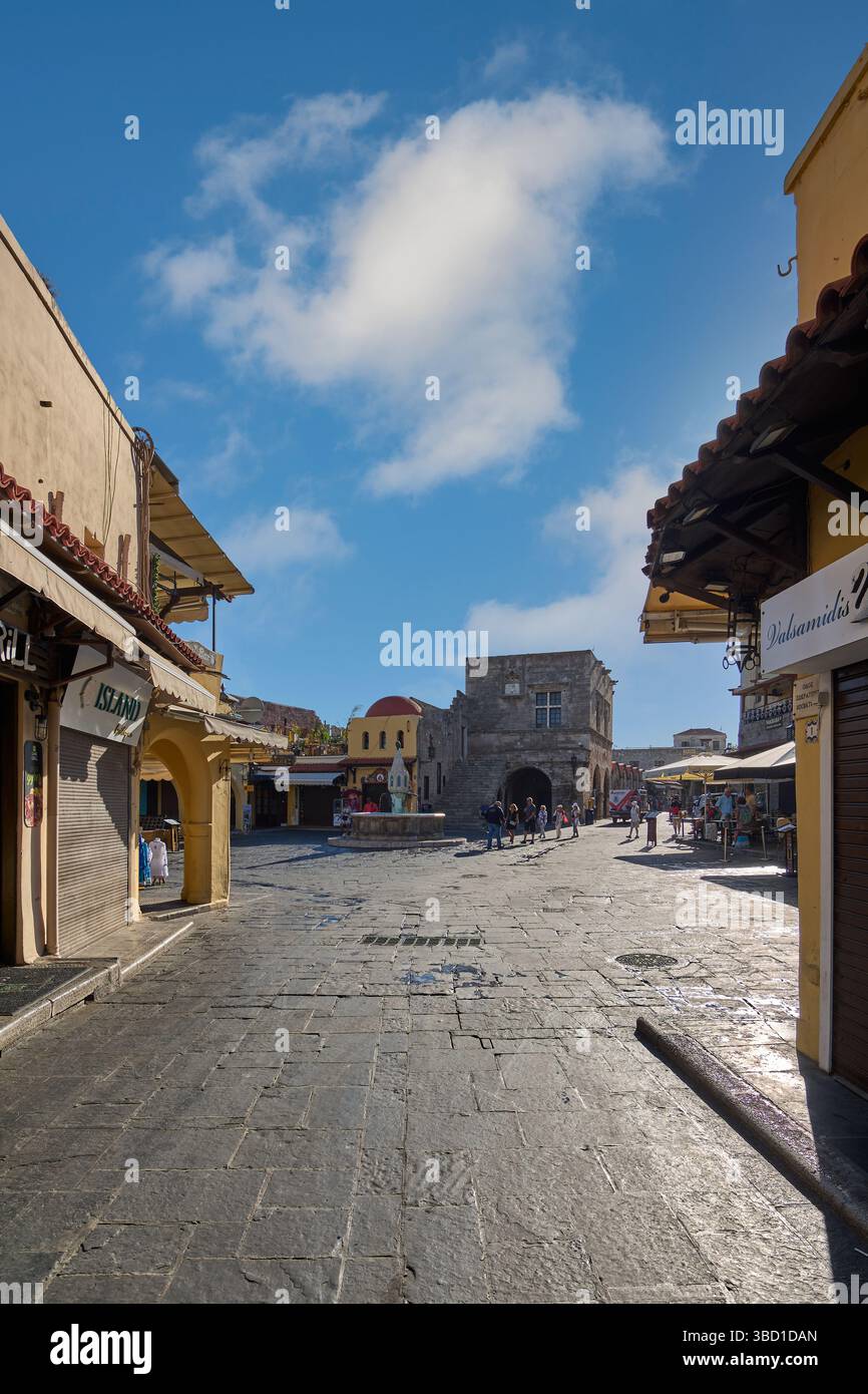 Rodas.Greece - may 22, 2025: A sun-drenched street in Rhodes' old town ...