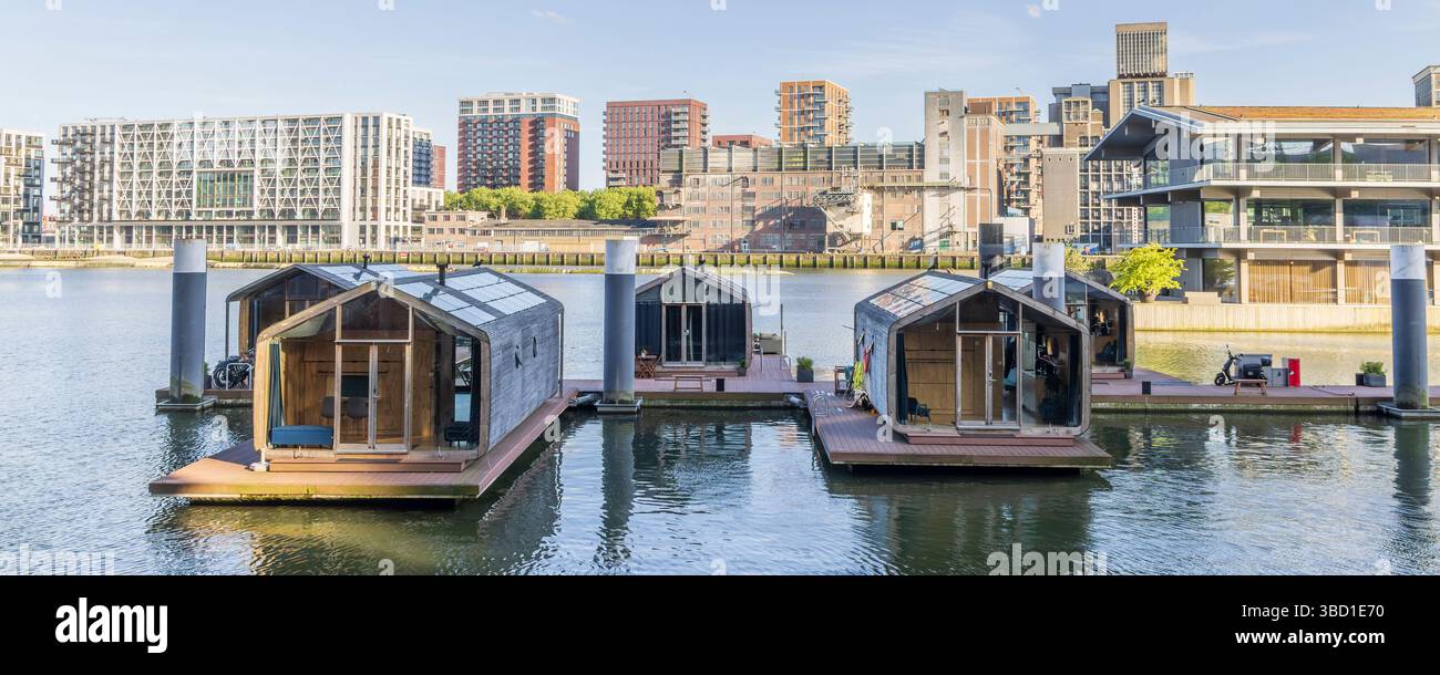 Tiny floating houses in Rotterdam port city in South-Holland the west ...