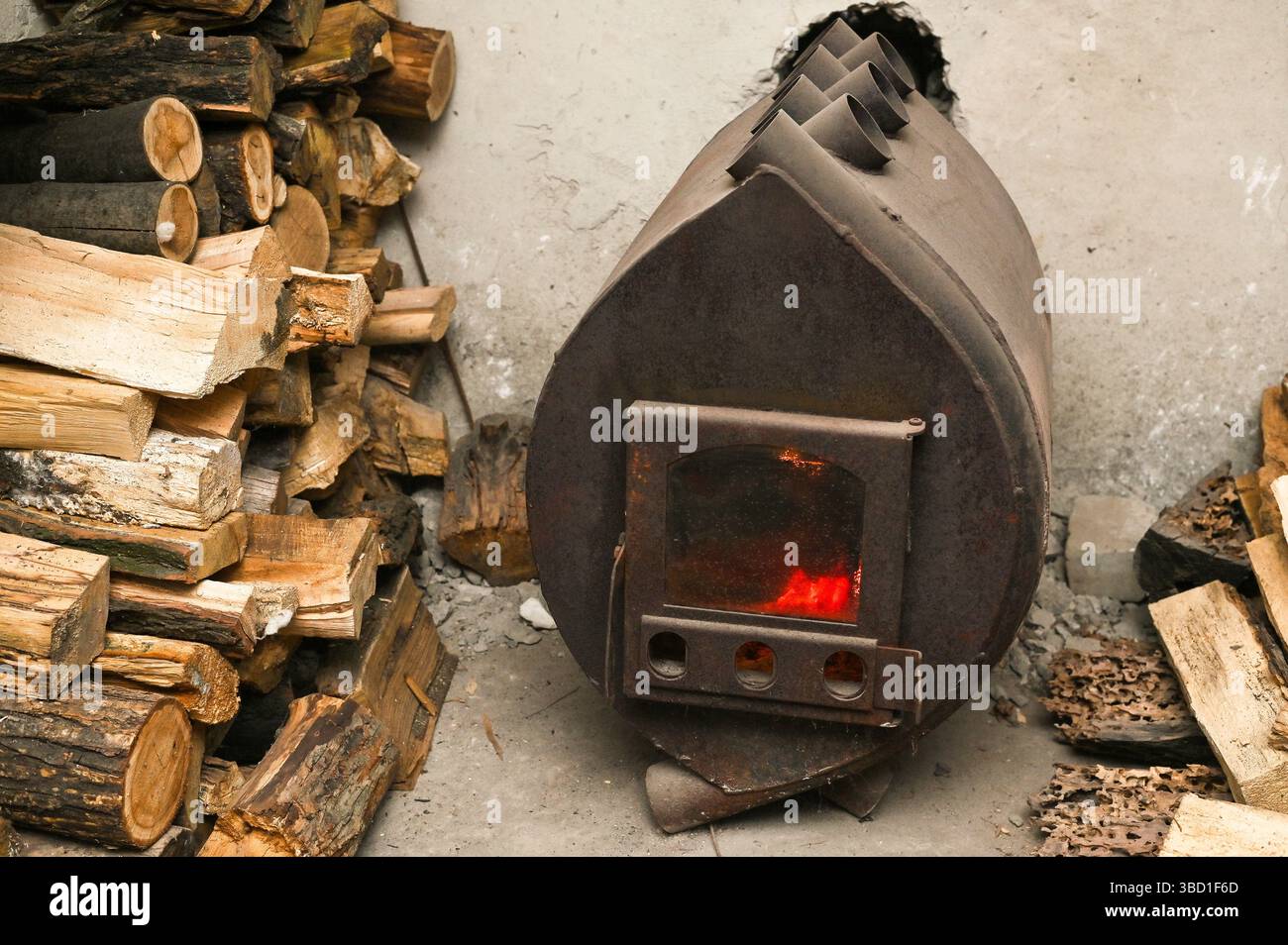 Burning firewood in fireplace creates hi-res stock photography and ...