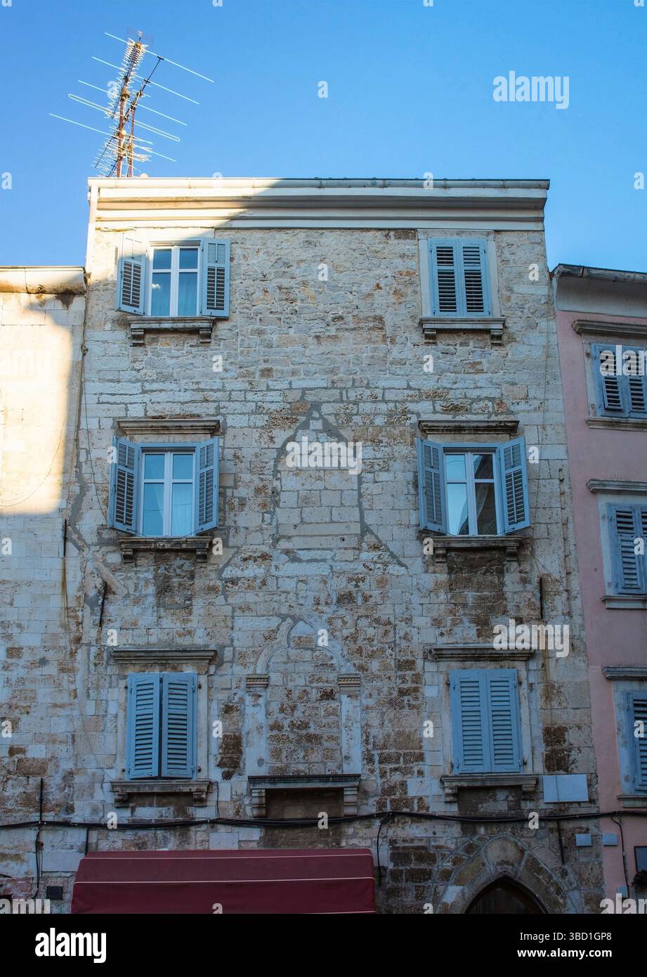Historic facade in Trg Forum square, Pula, Croatia. With Gothic origins ...
