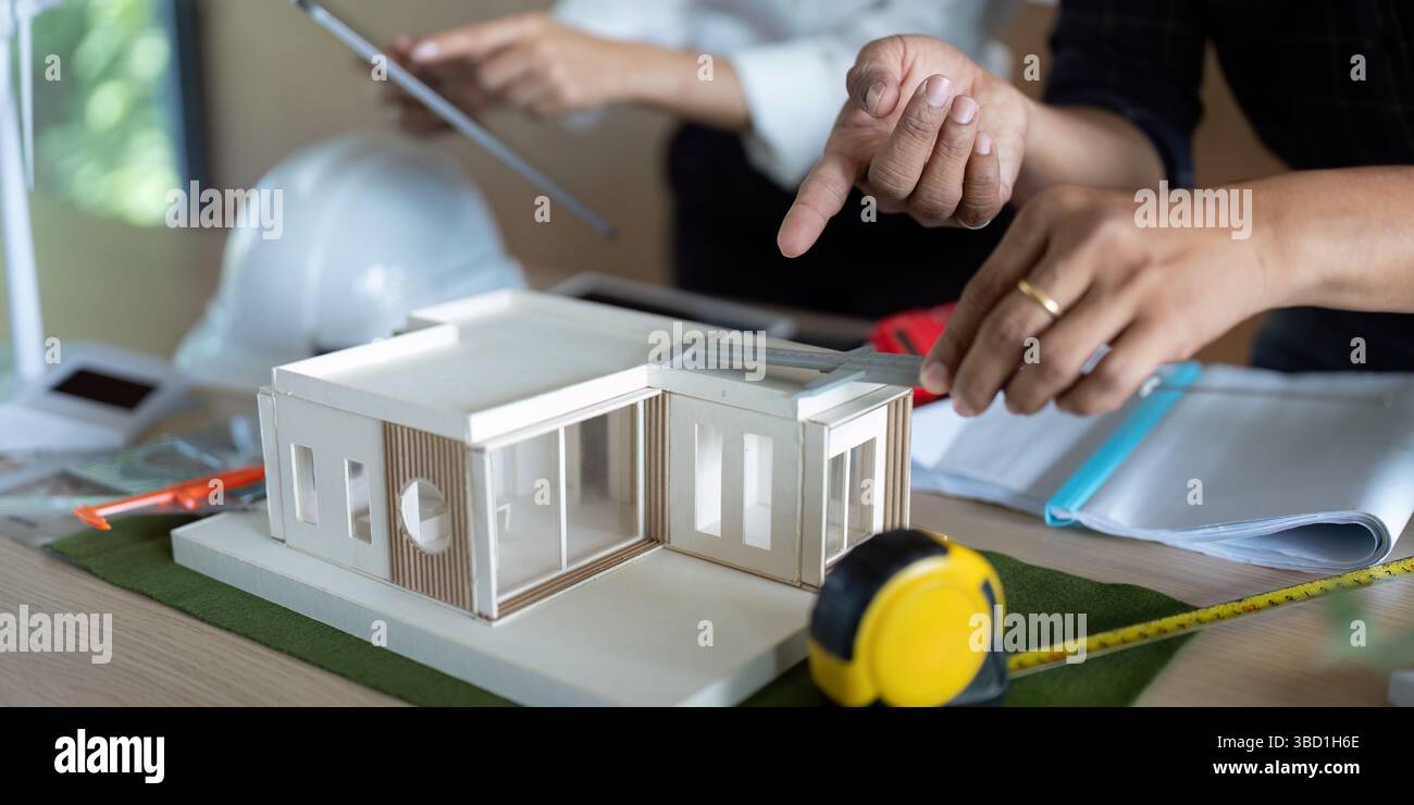 Eco-Friendly Engineering. Engineers collaborating on sustainable ...