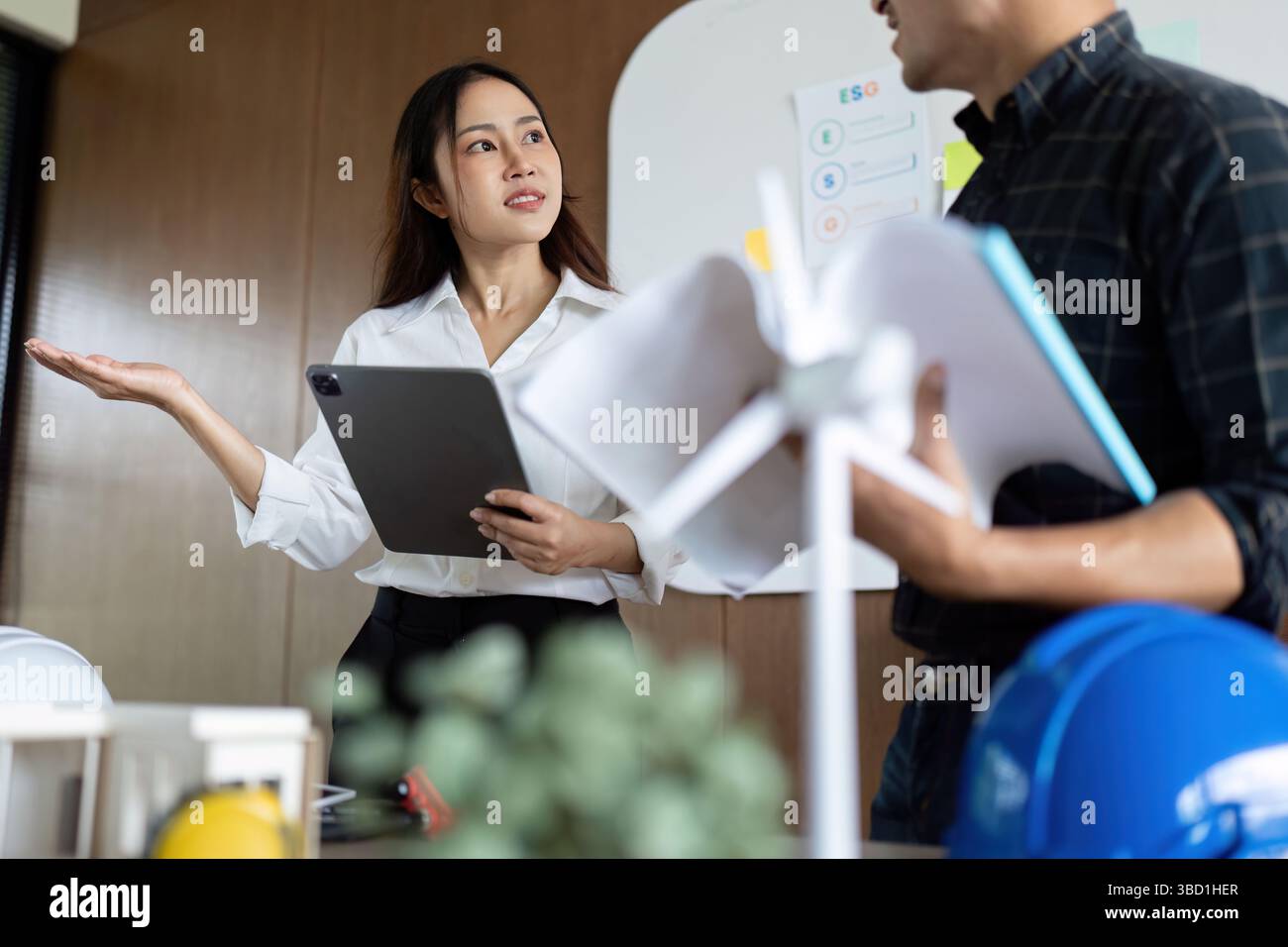 Sustainability and Engineering. Female engineer presenting sustainable ...