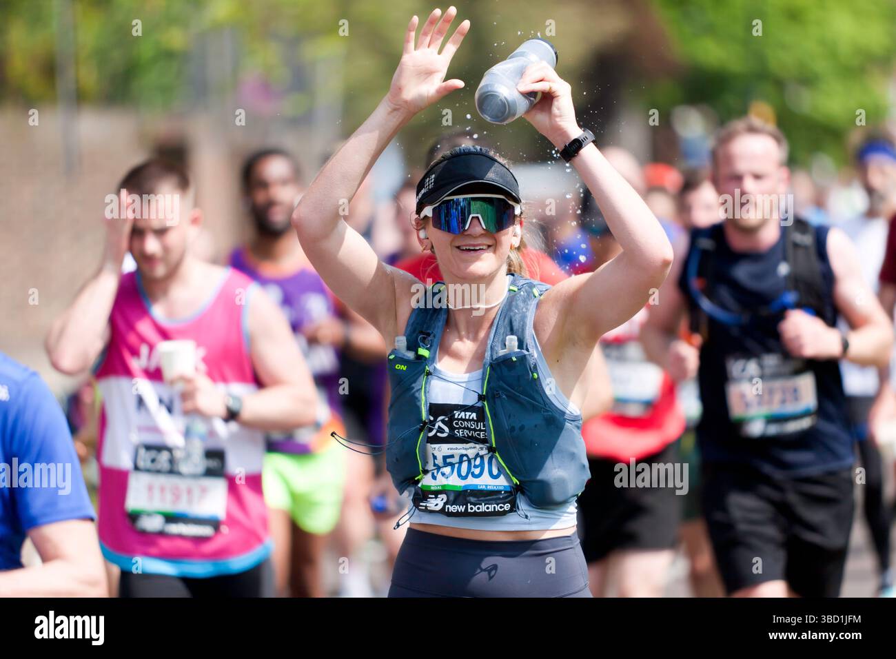 Ellie Livingston cooling off, during the warm and sunny 2025 London ...
