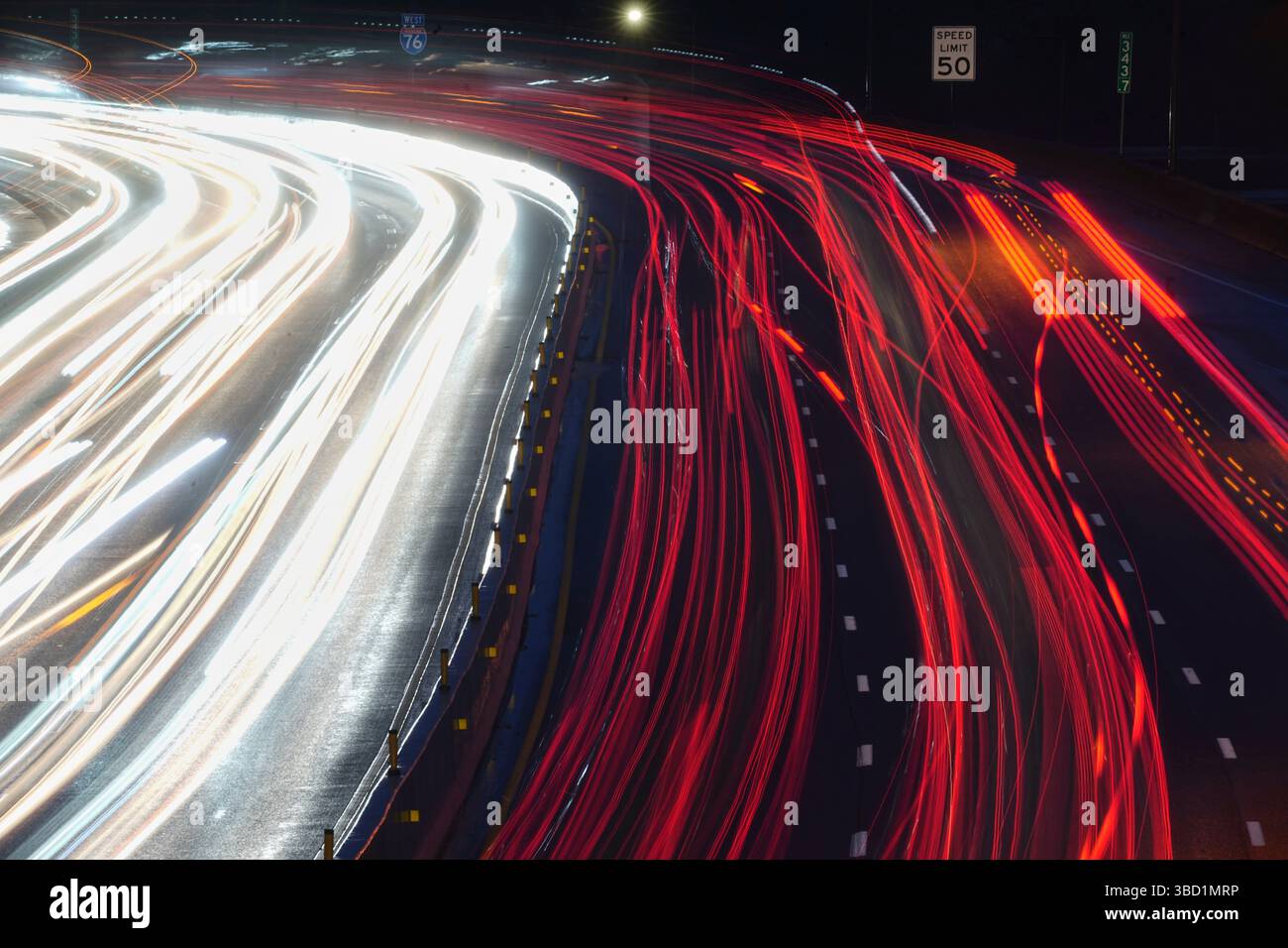 In this long exposure photograph traffic moves along Interstate 76 ...