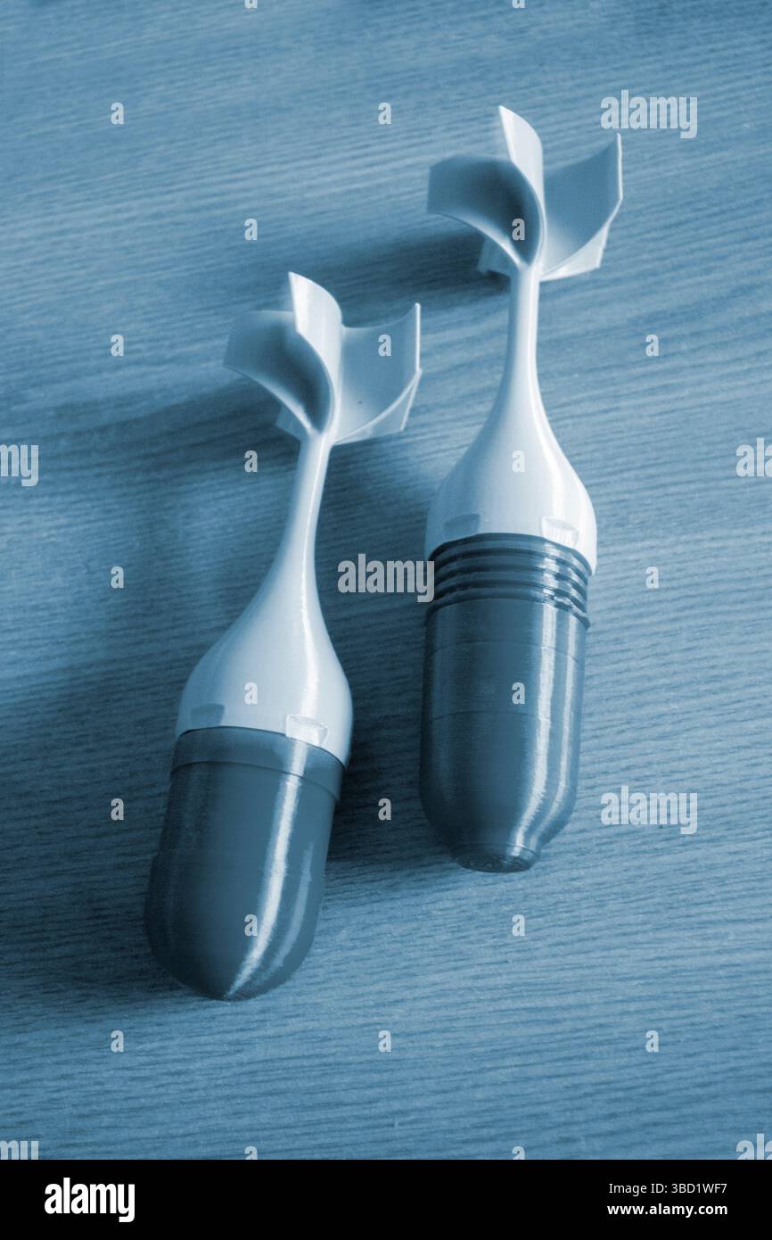 Prototype model of rocket bomb tip printed on 3D printer. Small colored ...