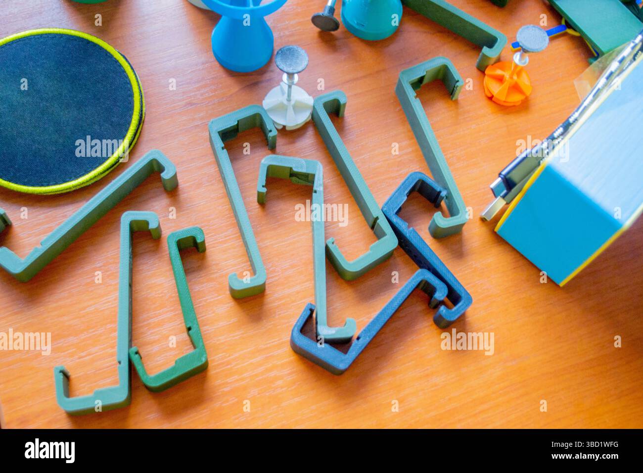 Objects printed on 3D printer from melted plastic close-up. Model ...