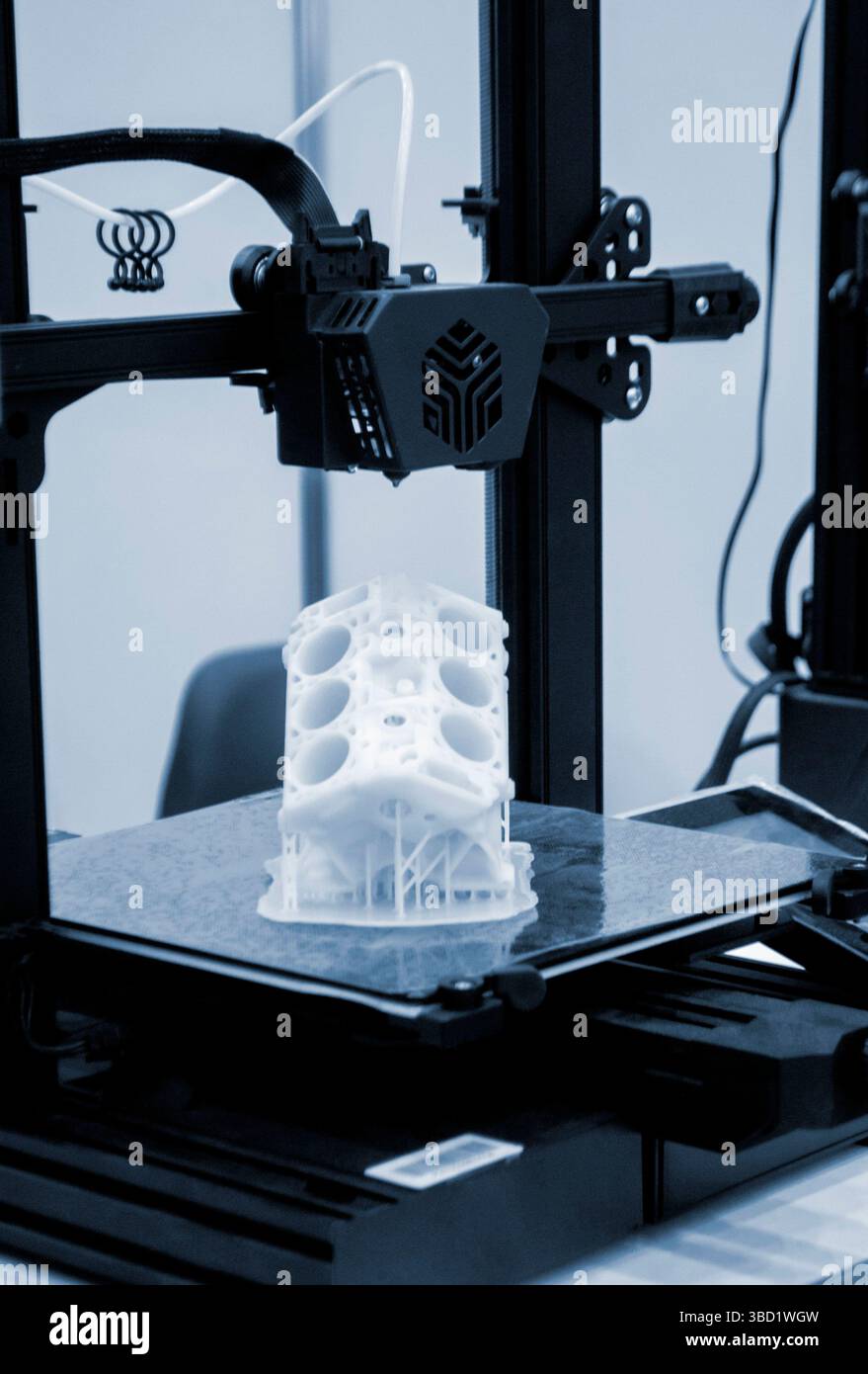 Prototype of car engine printed on 3D printer from molten white plastic ...