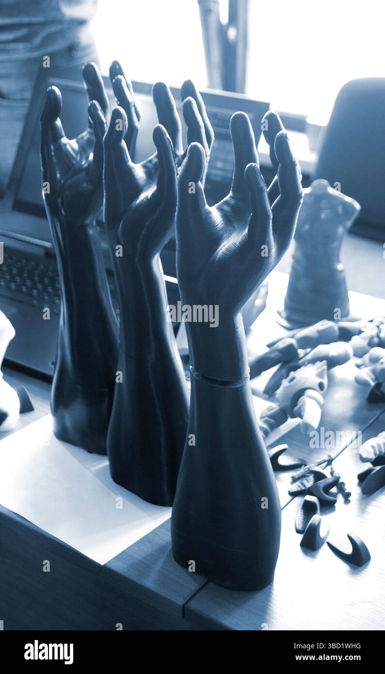 Art Object human hands printed on 3D printer. Model prototype of human ...