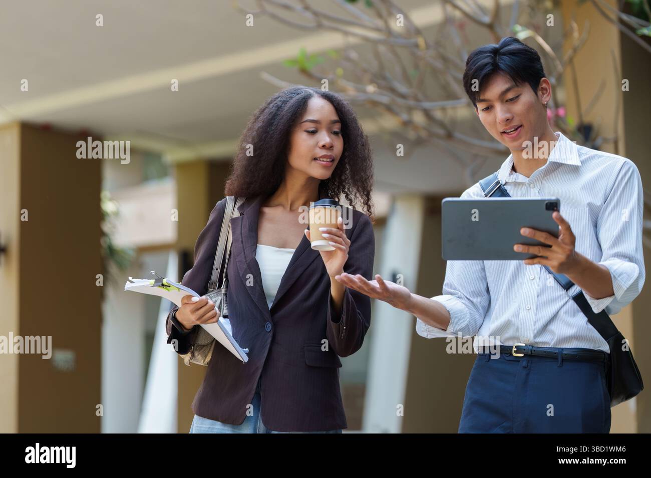 Sustainability and Engagement. A woman and a young man share thoughts ...
