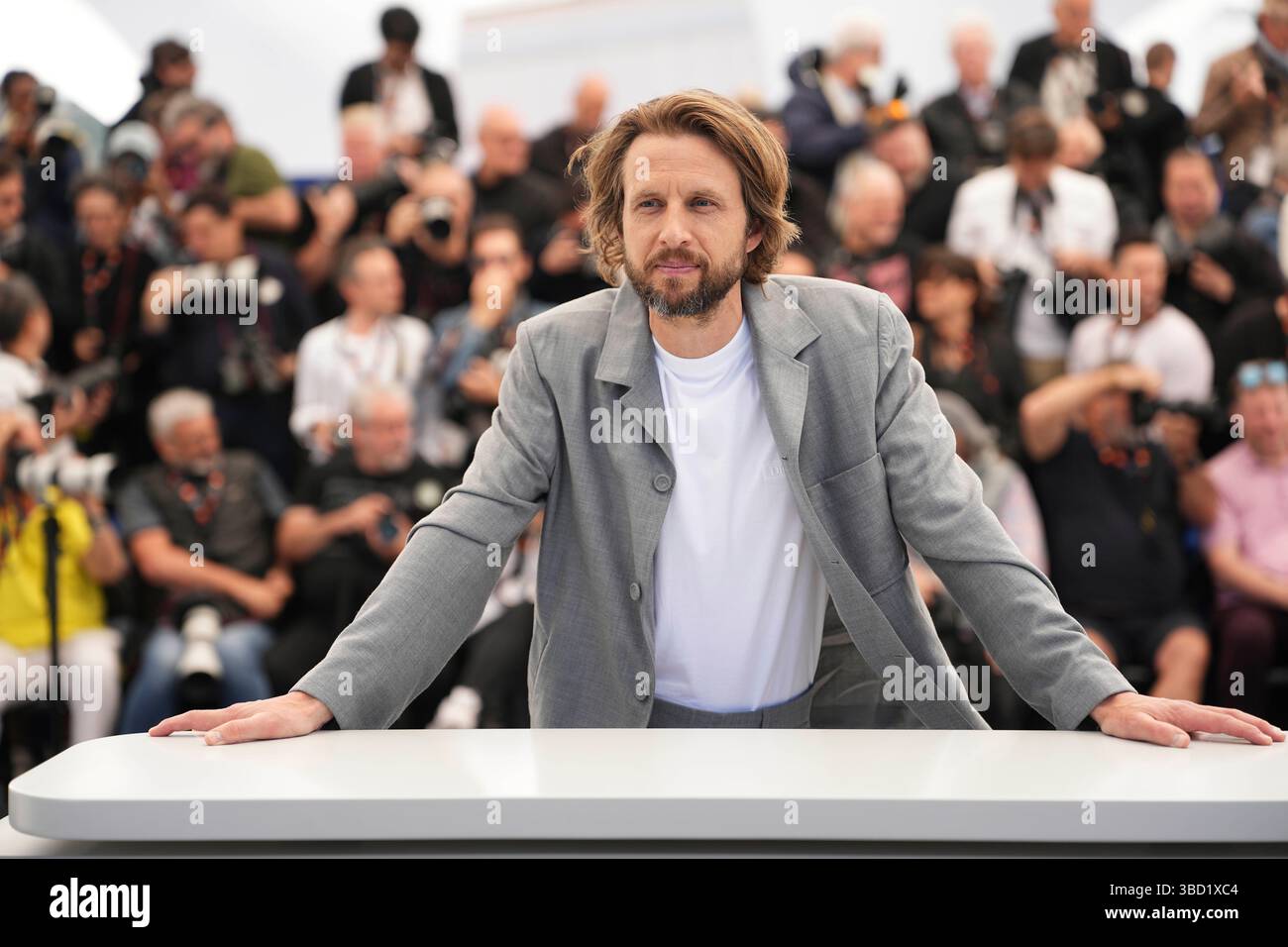 Anders Danielsen Lie poses for photographers at the photo call for the film 'Sentimental Value ...