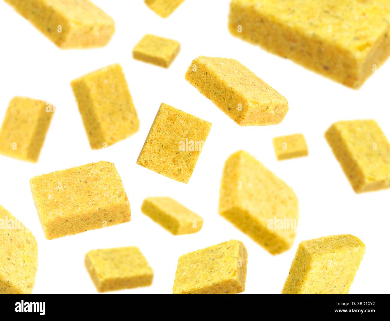 Bouillon cubes in air on white background Stock Photo - Alamy
