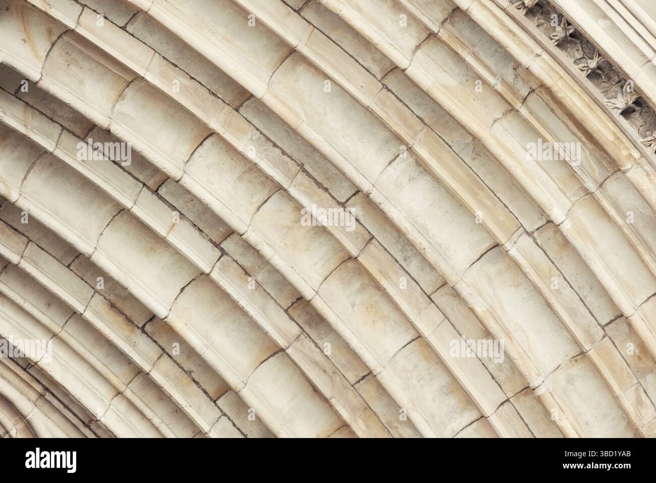 lose-up of historic classic stone arch showing detailed ribbed vault ...