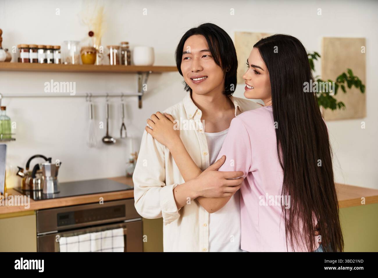 Affectionate couple embraces each other while enjoying their intimate ...