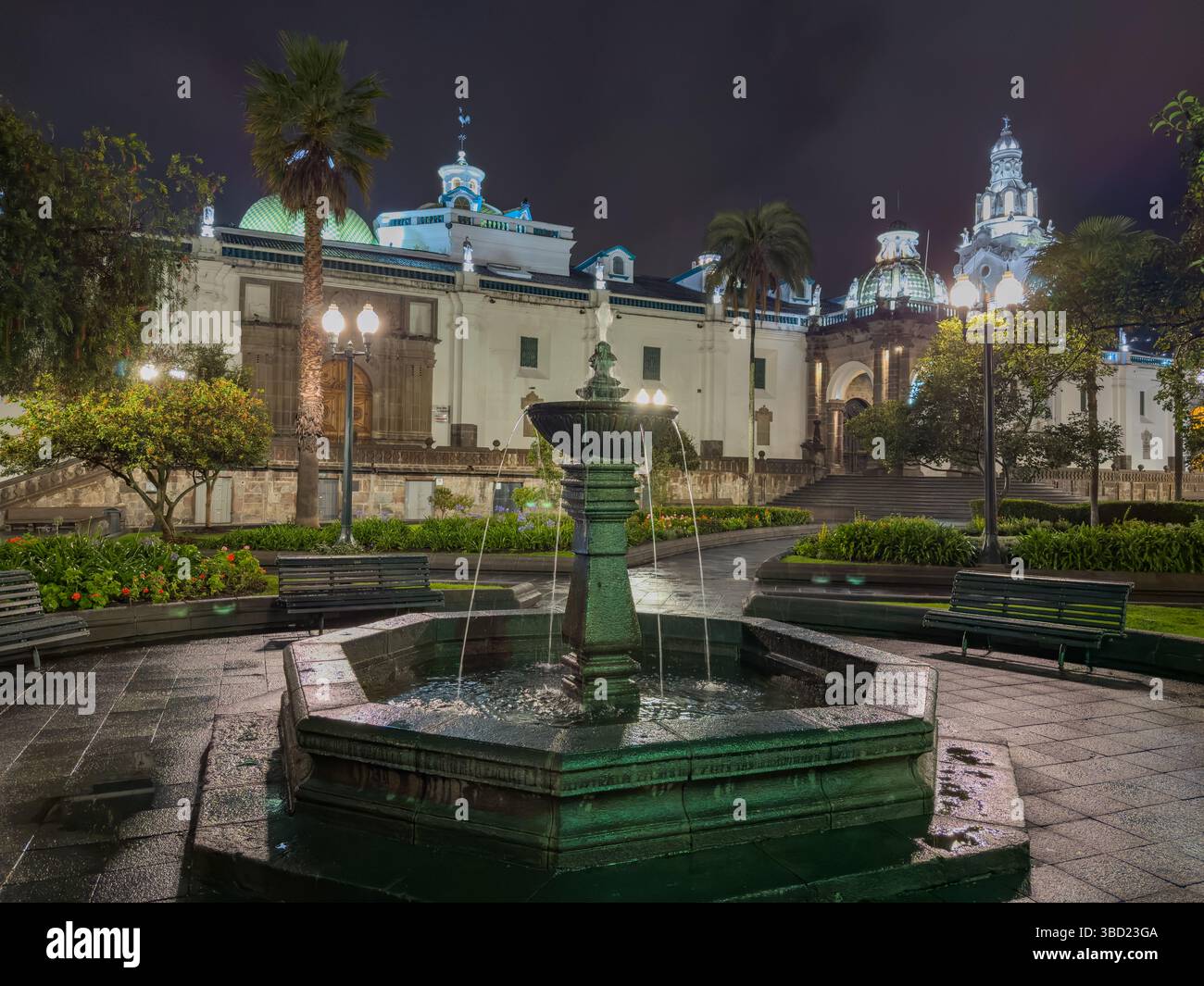NIght view of the Spanish colonial fountain in the Plaza Grande in ...