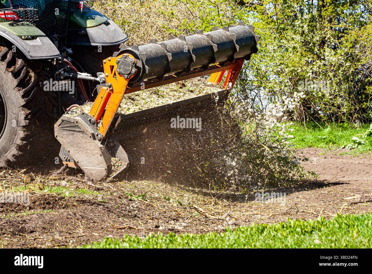 Picture of a tractor specialized in forest clearing that is in the ...