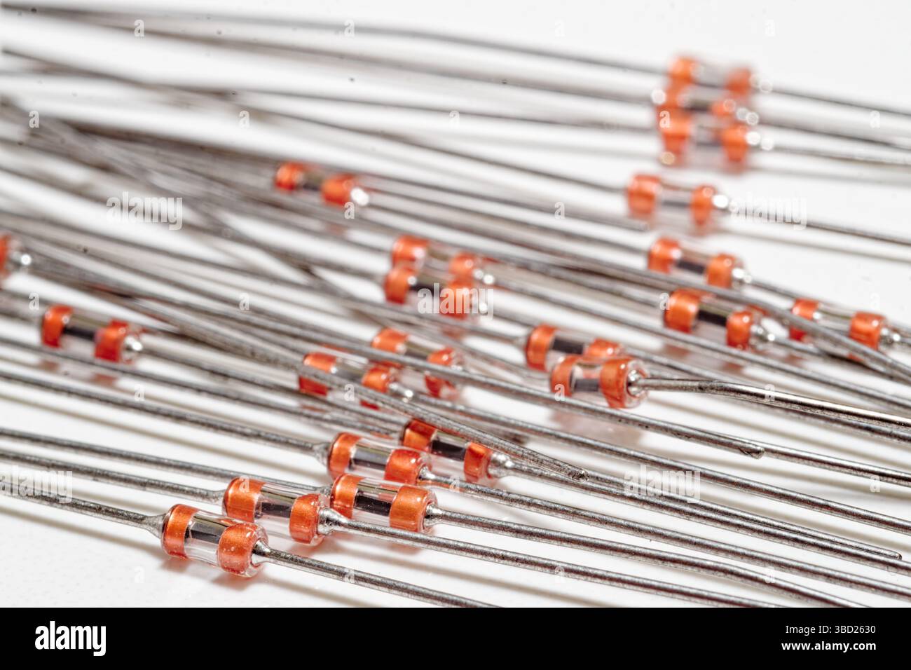 multiple electronic glass type diodes on white background Stock Photo ...