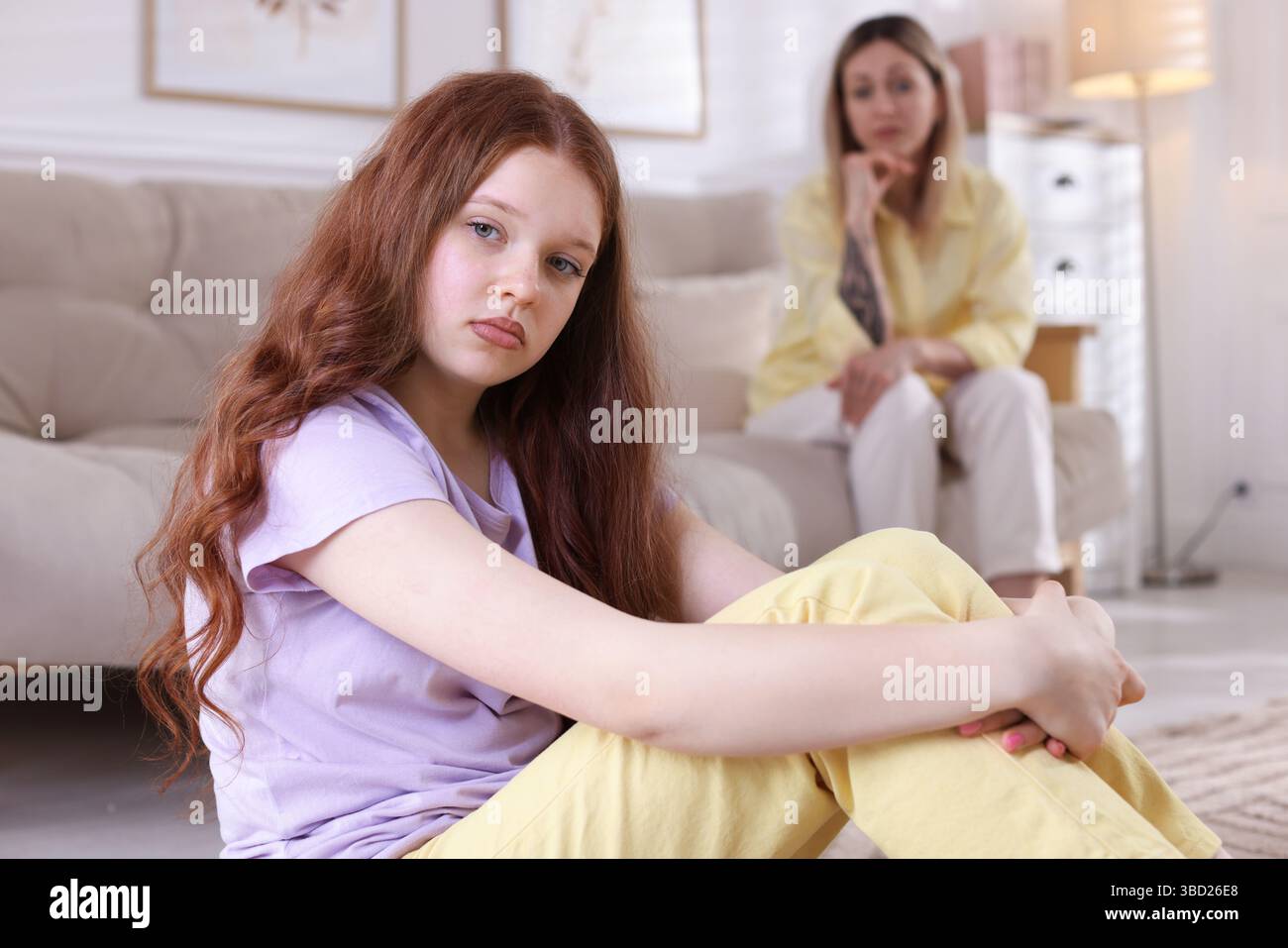 Teenage daughter ignoring her mother at home, selective focus Stock Photo - Alamy