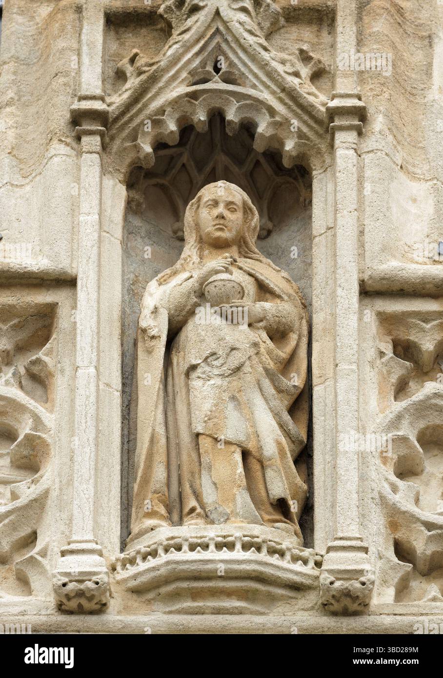 Stone statue of Mary Magdalen over the entrance to the chapel at ...