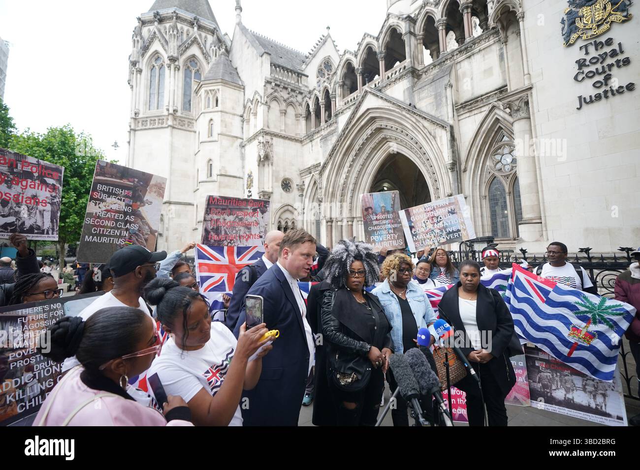 (left to right) Barrister Michael Polak, with Bertice Pompe and ...