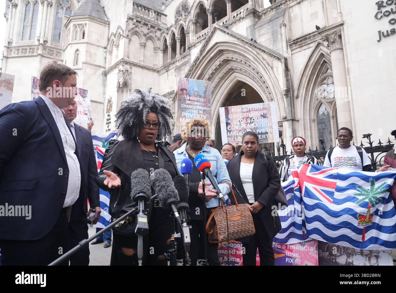 Bertice Pompe (second left) and Bernadette Dugasse (second right), two ...