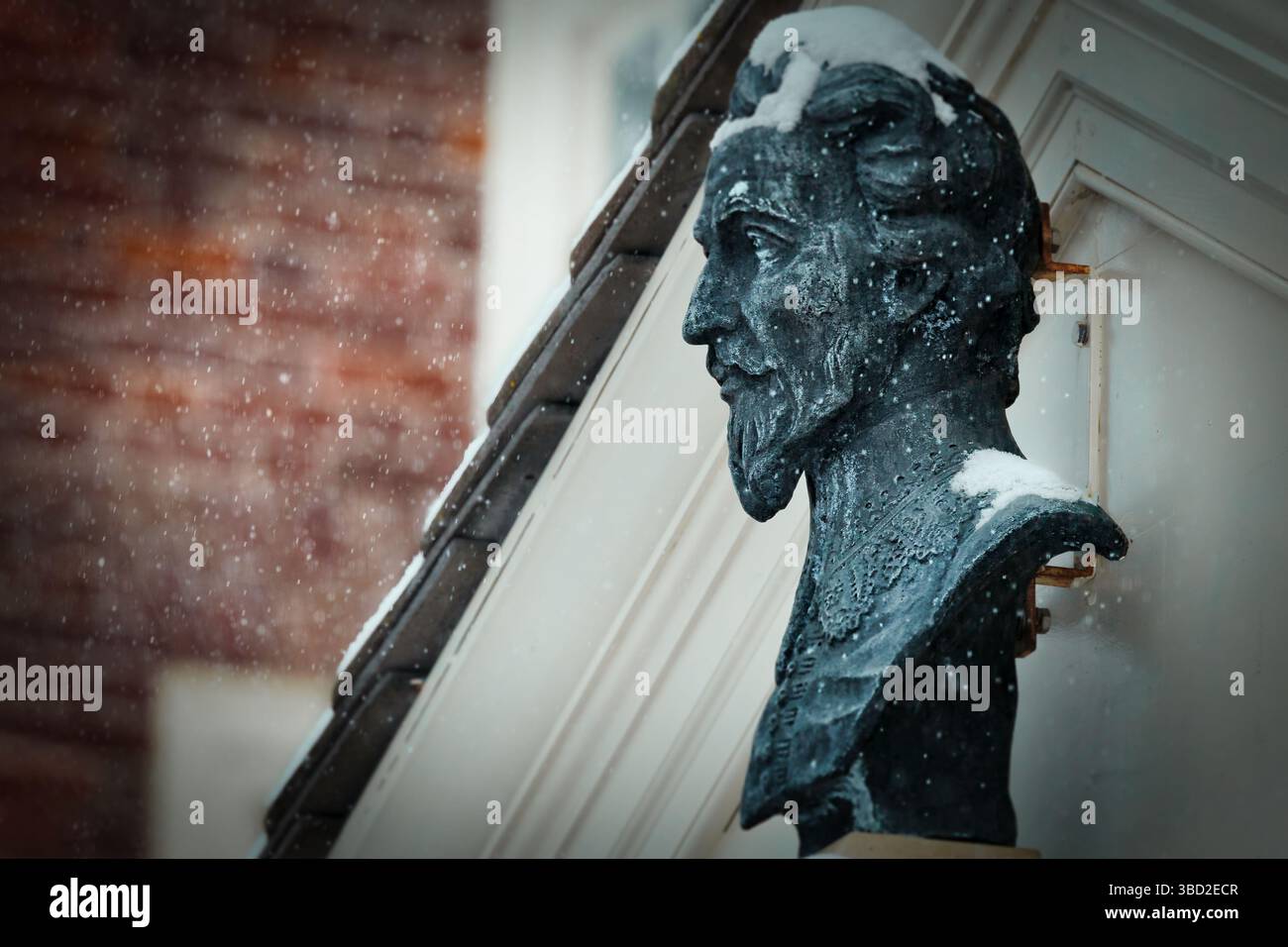 The bust of Sir Walter Raleigh, in a snow storm, over the door to the ...