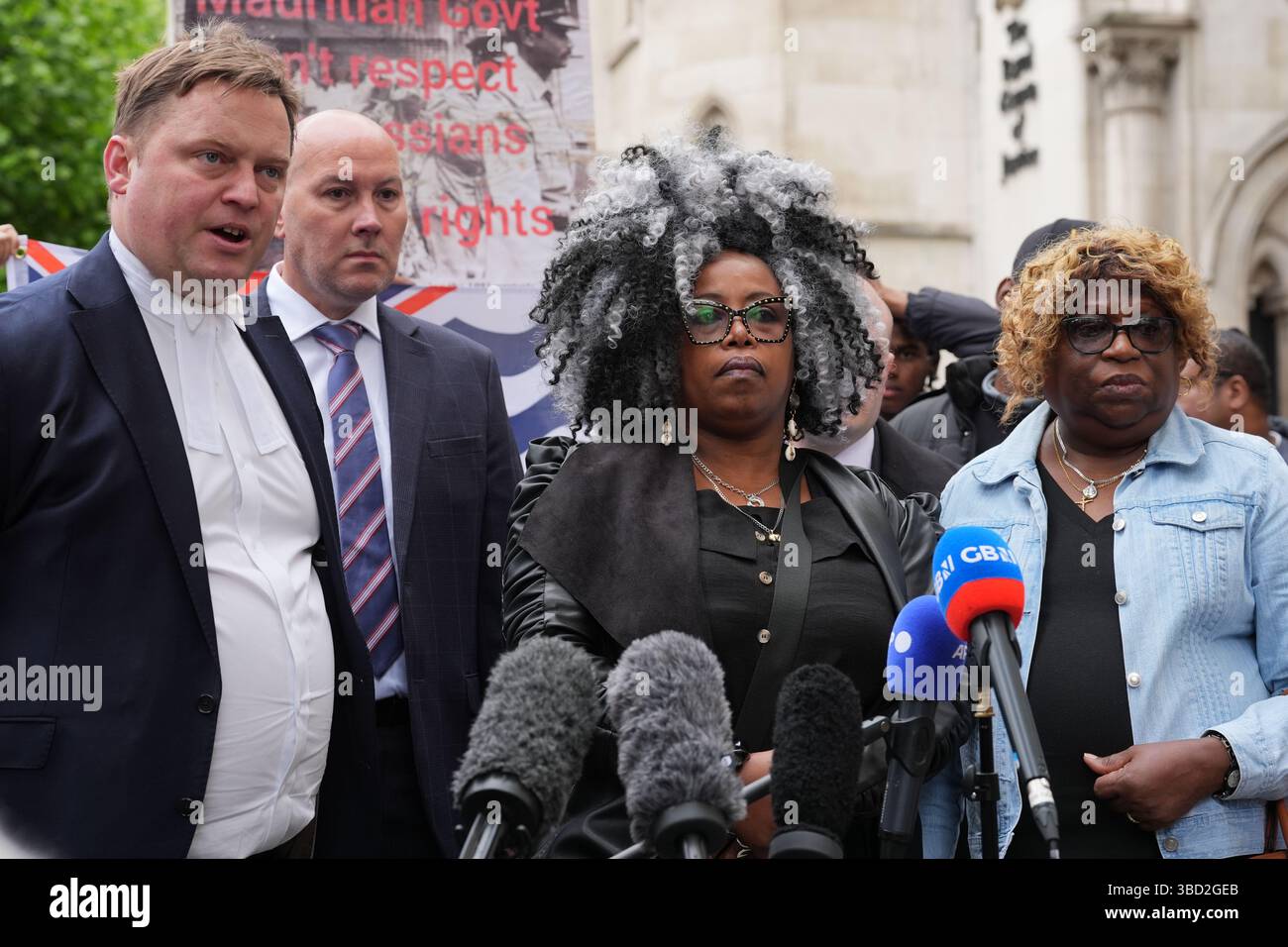 Barrister Michael Polak, with Bertice Pompe (centre) and Bernadette ...