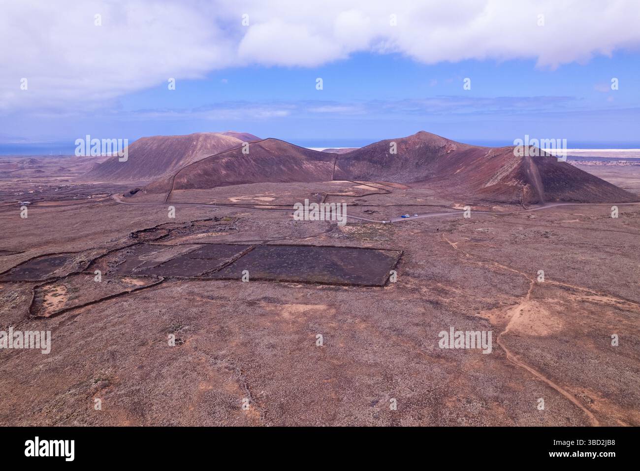 Drone photo of red desert hills and volcanic ground in Fuerteventura ...