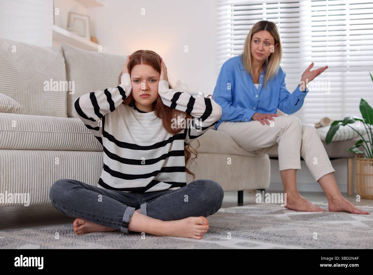 Teenage daughter ignoring her mother at home, selective focus Stock Photo - Alamy