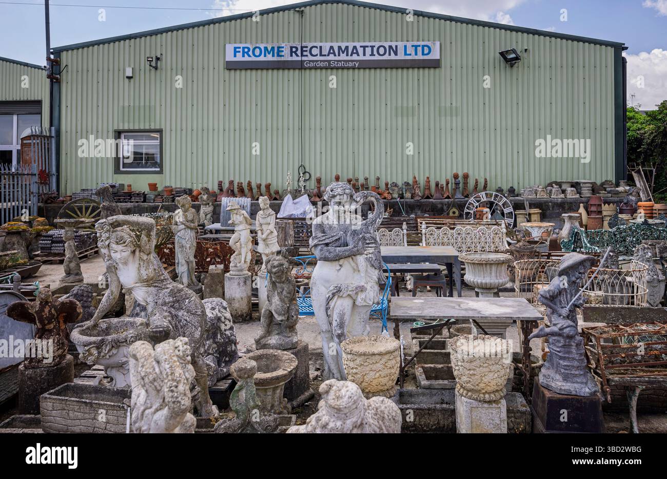 Assortment of stone statues and outdoor garden reclaimed objects at ...