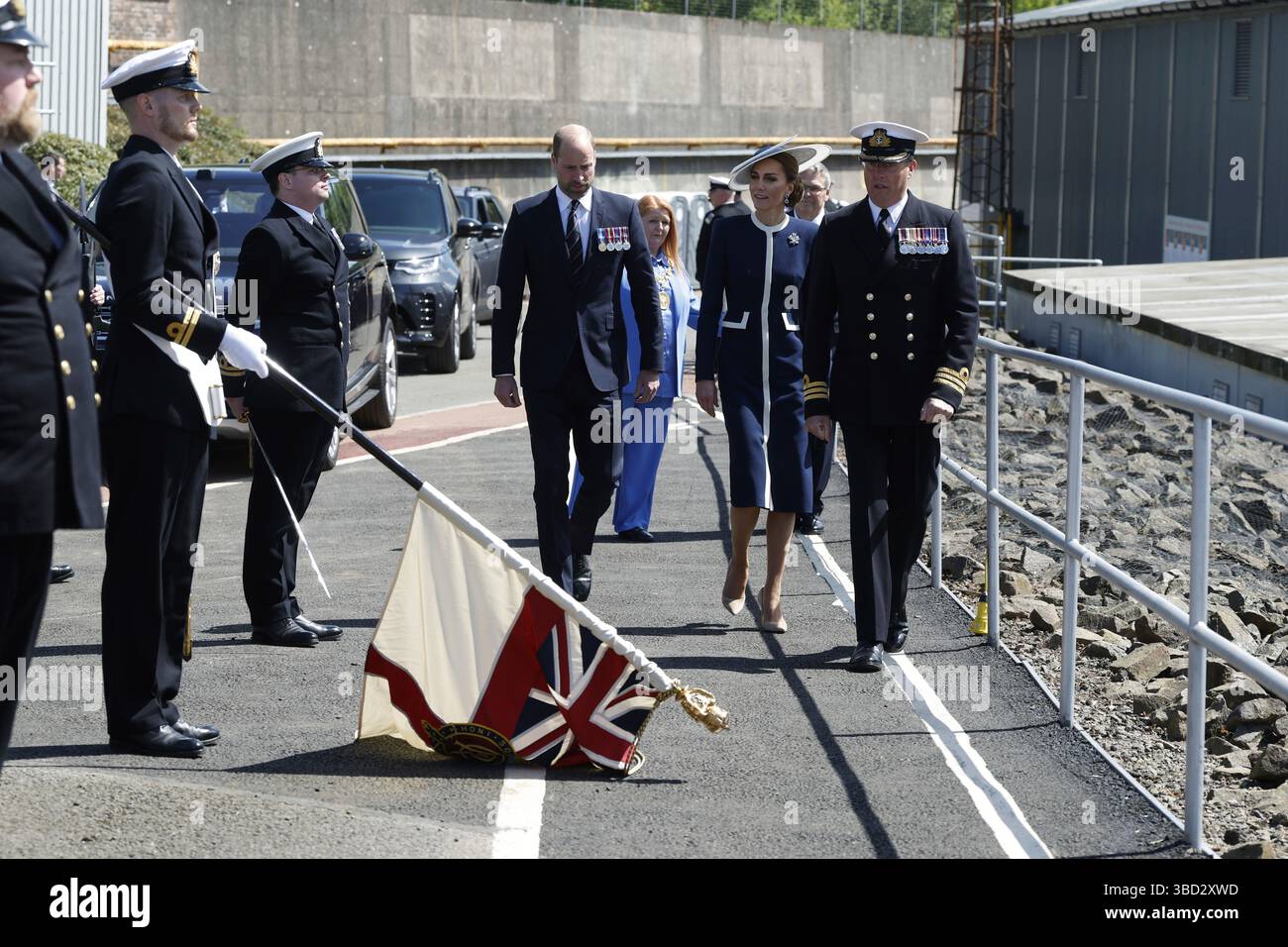 Britain's Prince William, centre, and Princess Kate attend the naming ...